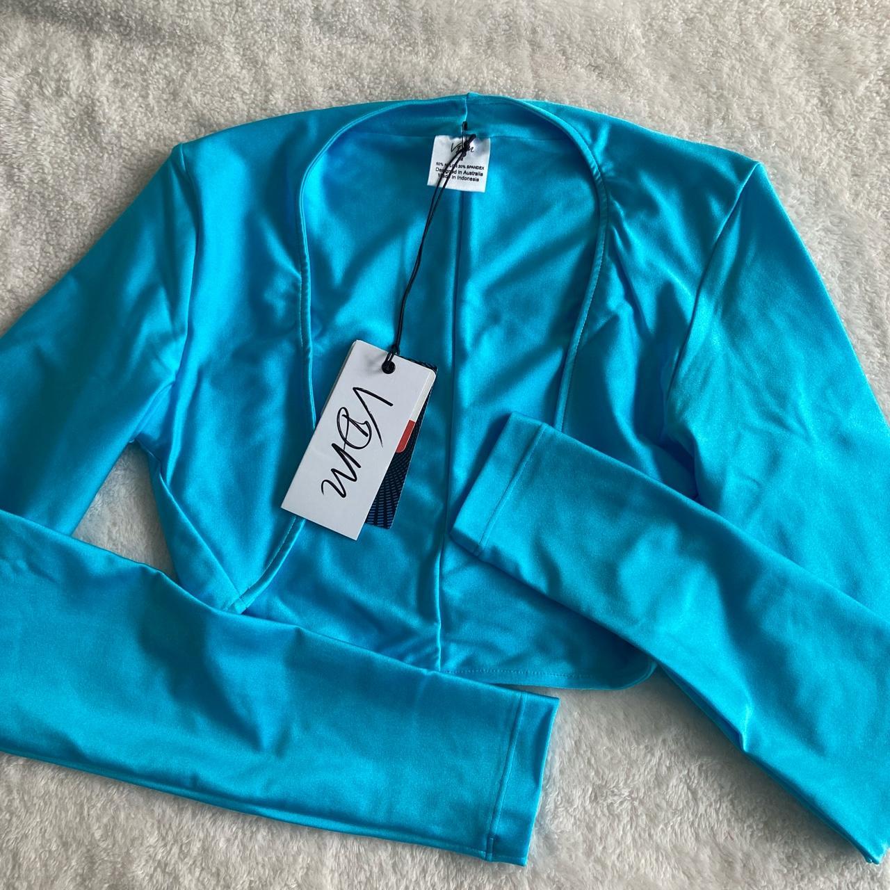 VDM the Label Swim + Resort aqua blue long sleeve... - Depop