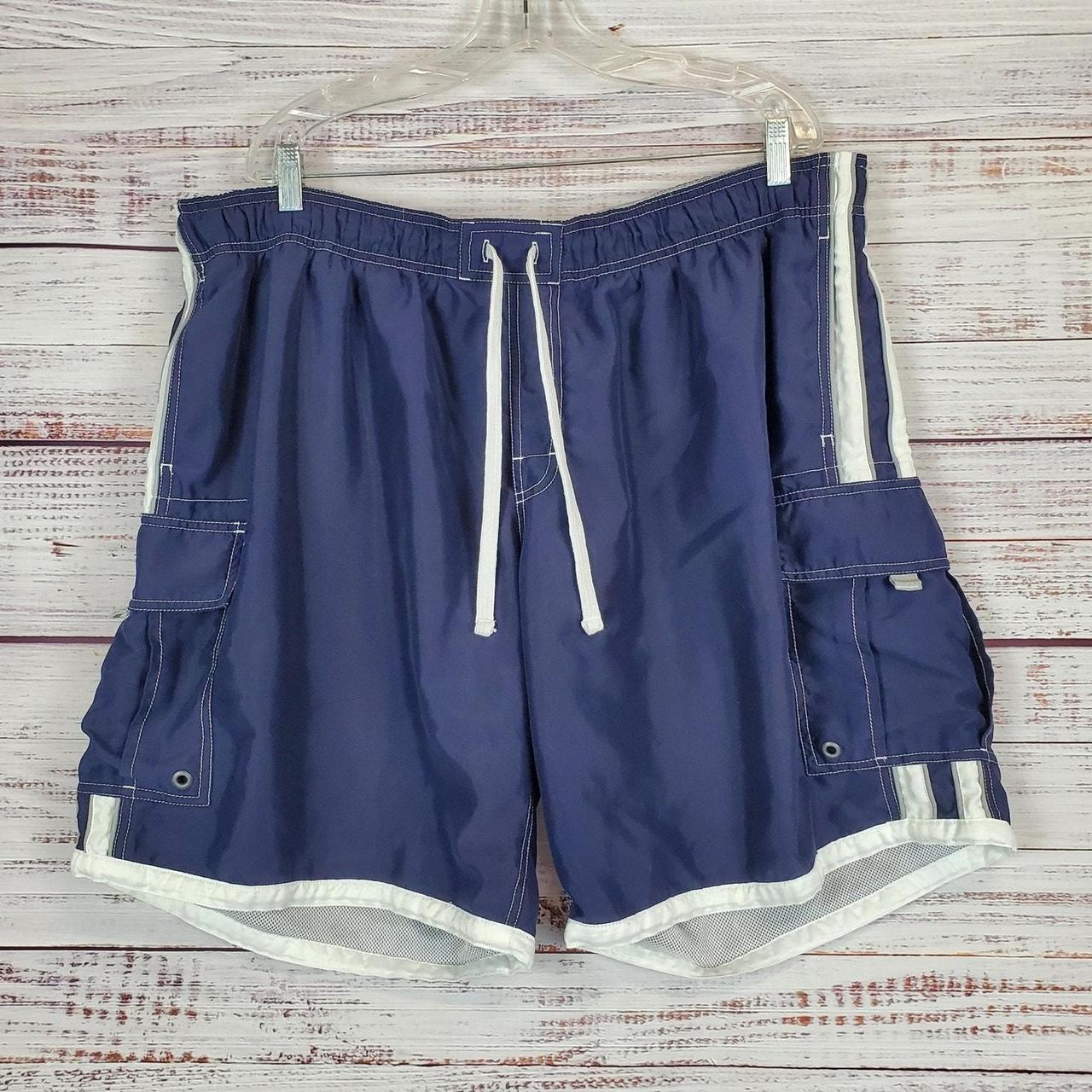 Navy Swim suit with velcro and slip in pockets.... | Depop