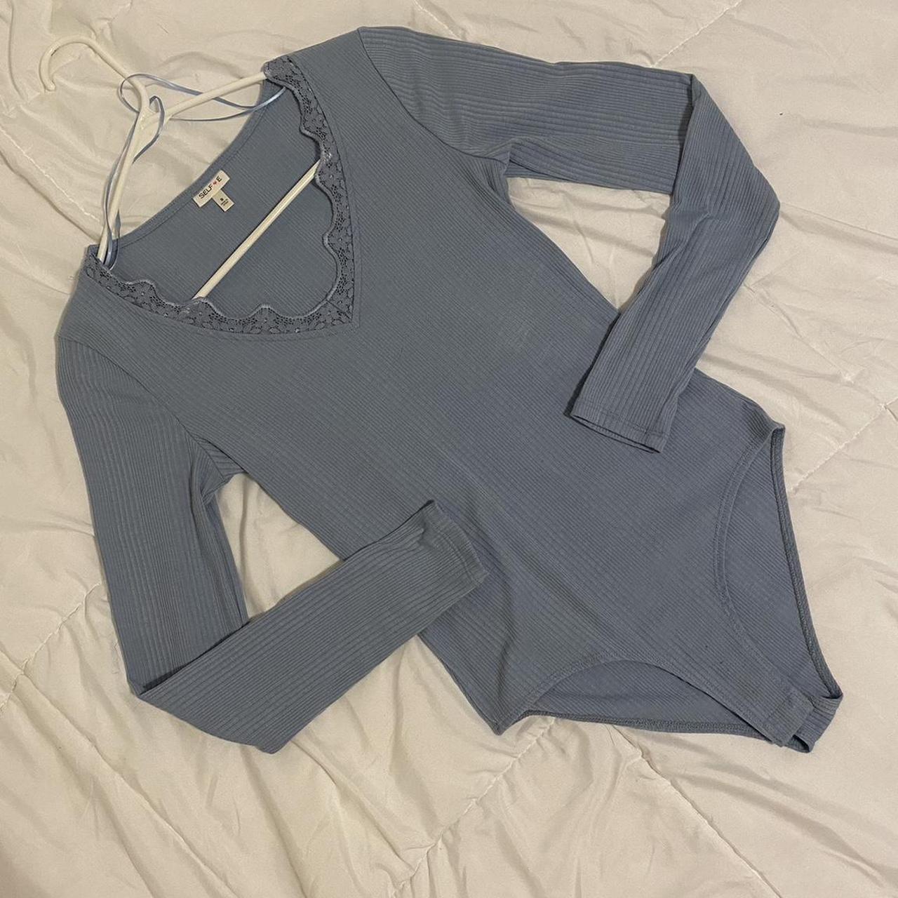 Super cute baby blue body suit with a lace trim, in... - Depop