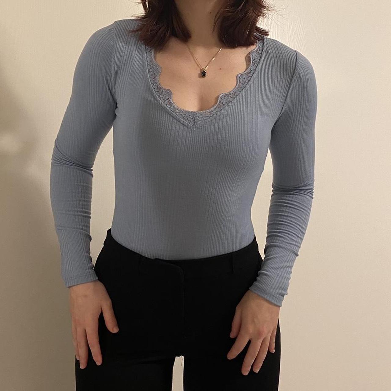 Super cute baby blue body suit with a lace trim, in... - Depop