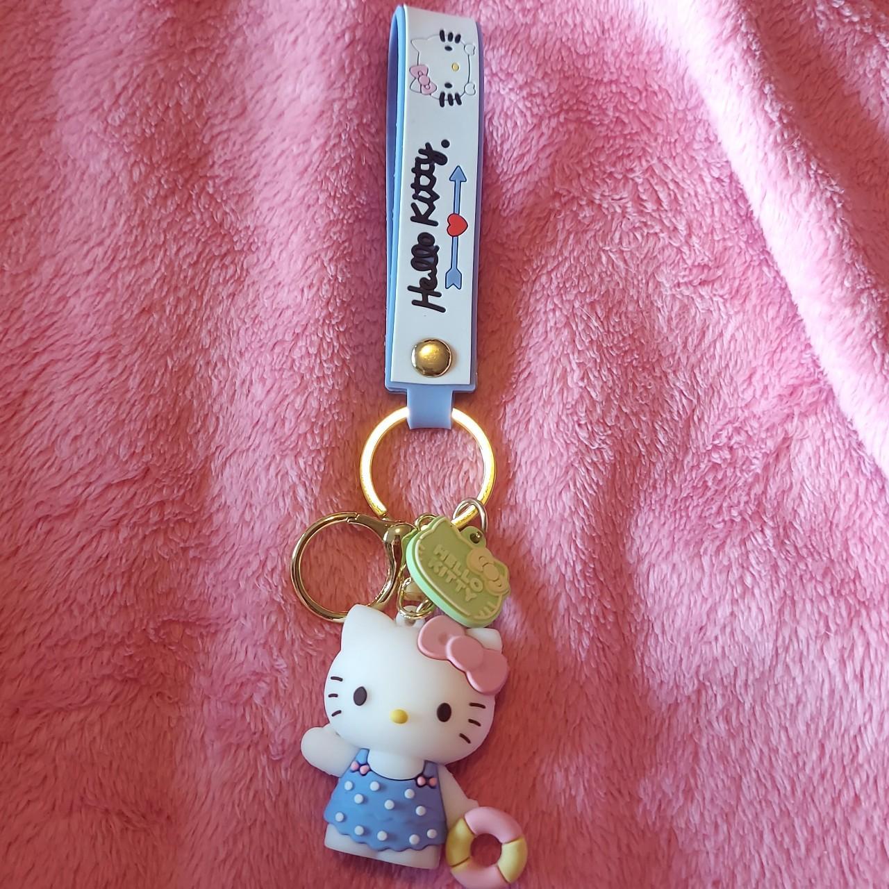 Hello kitty keychain Hello kitty beachday keychain... - Depop