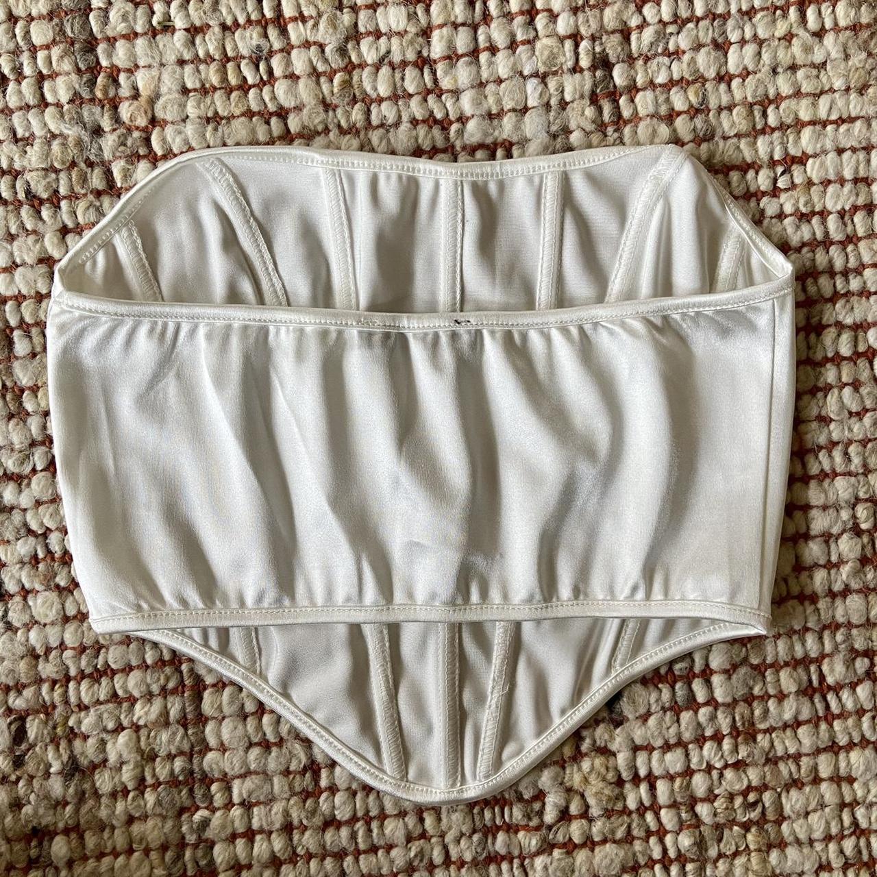 Structured satin corset. Elastic back. Never worn. - Depop
