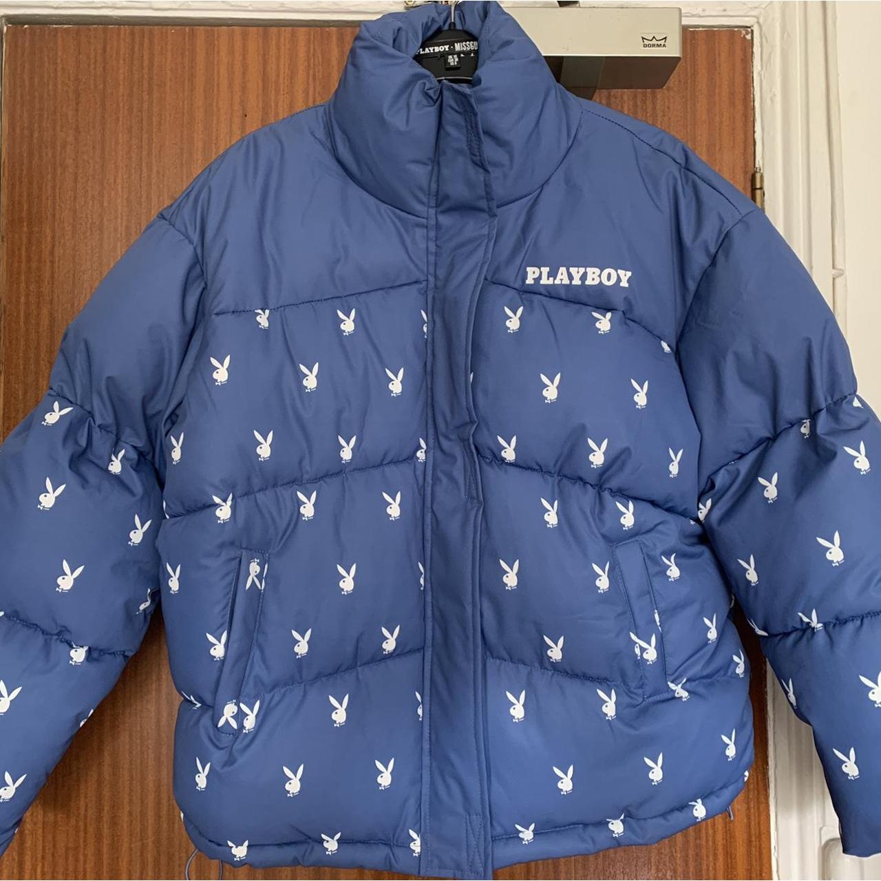 Blue playboy jacket, with pockets but no hood. Worn... - Depop