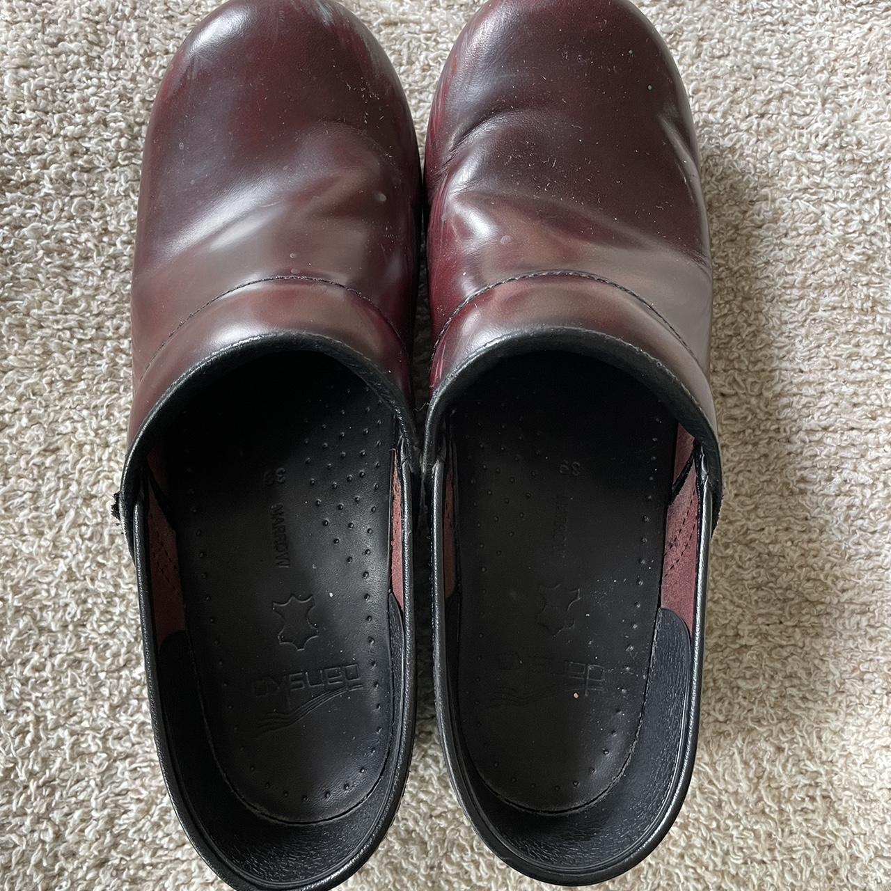 Dansko clogs in burgundy. They have some wear on the... - Depop