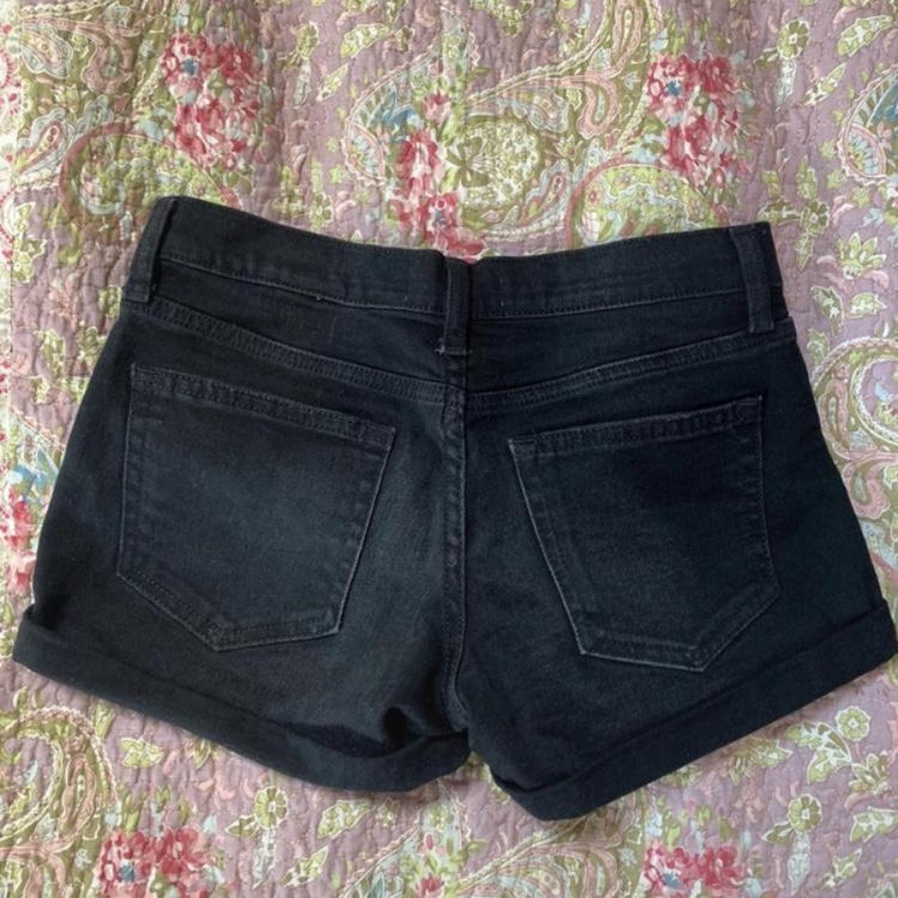 black micro mini shorts low waisted and v... - Depop