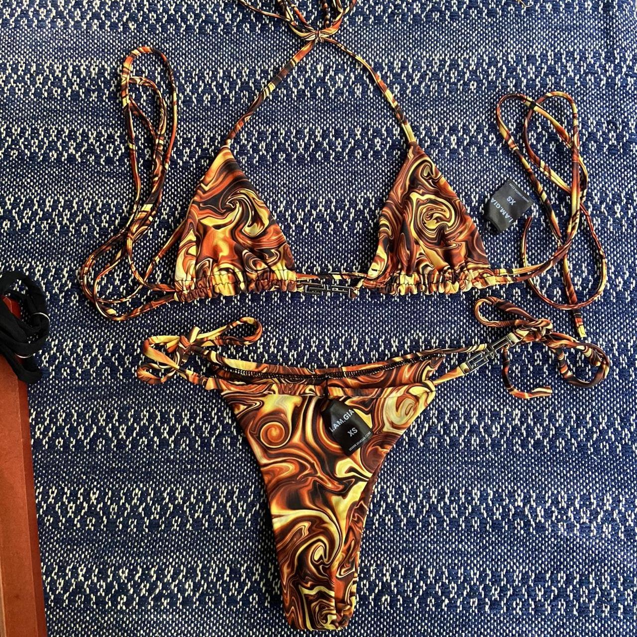 IAMGIA Binki Set brand new worn once on vacation... - Depop
