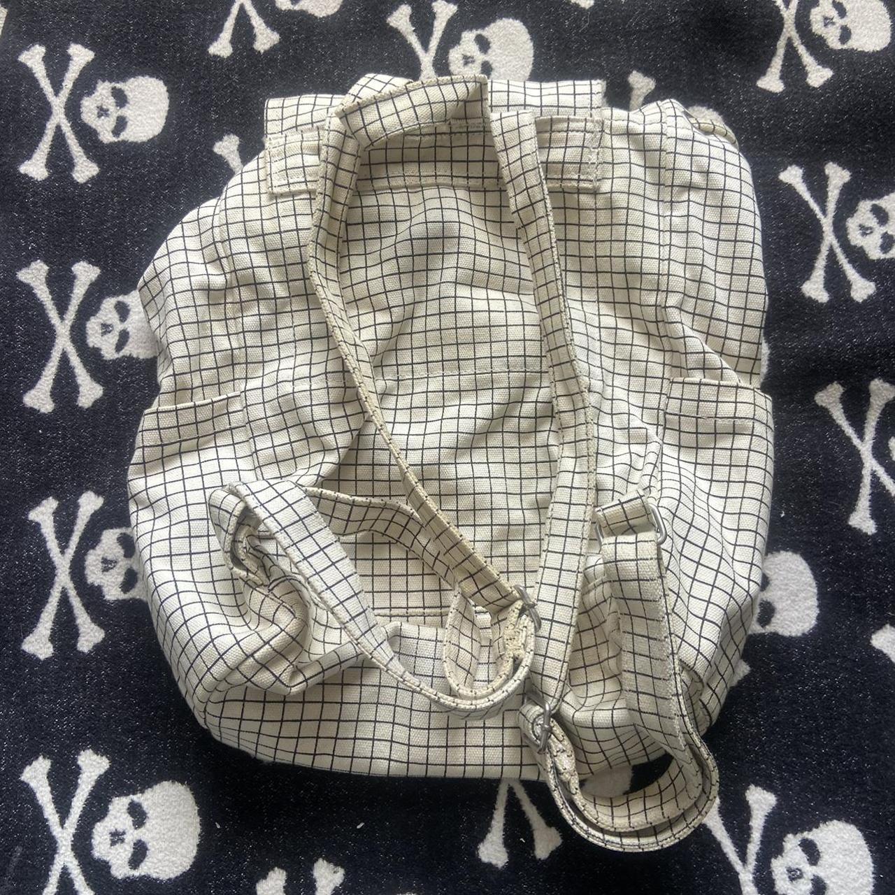 Very cute checkered backpack! She has a great main... - Depop