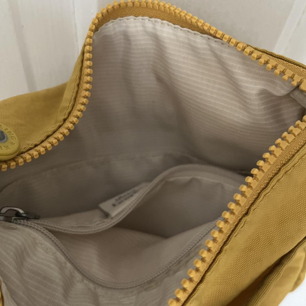 yellow cross body kipling bag some marking shown - Depop