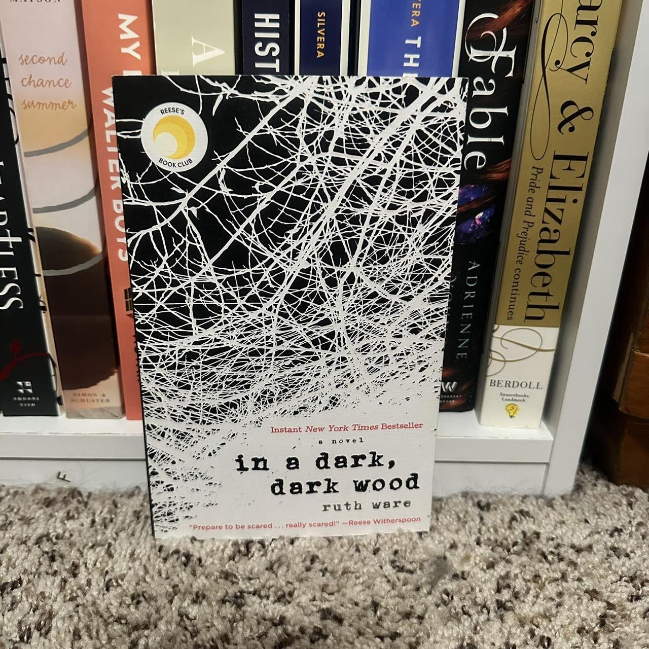 In A Dark, Dark Wood by Ruth Ware, paperback - Depop