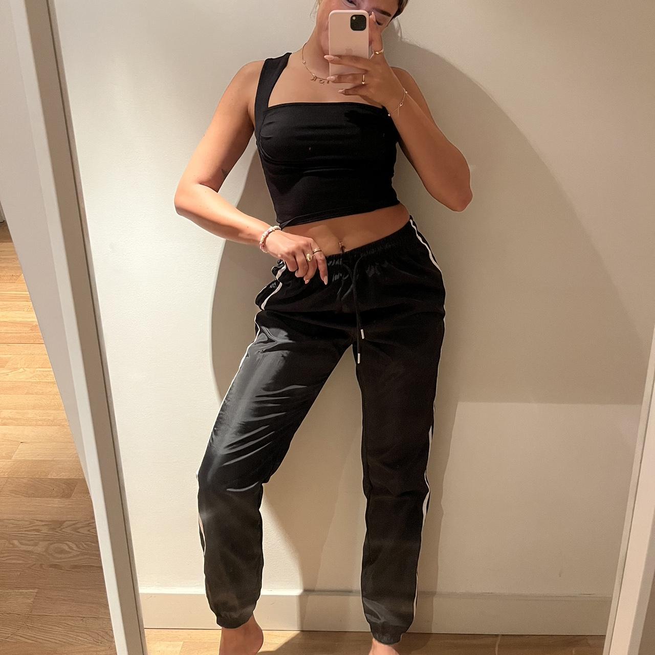 Cuffed shell joggers with side stripe. Only worn a... - Depop