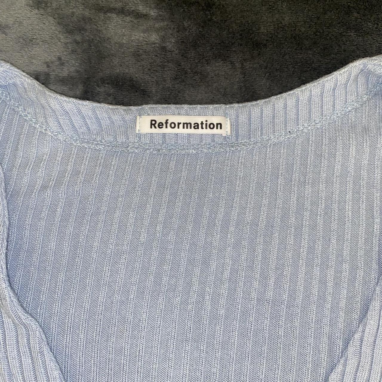 Baby blue Reformation top with buttons. Size XS - Depop