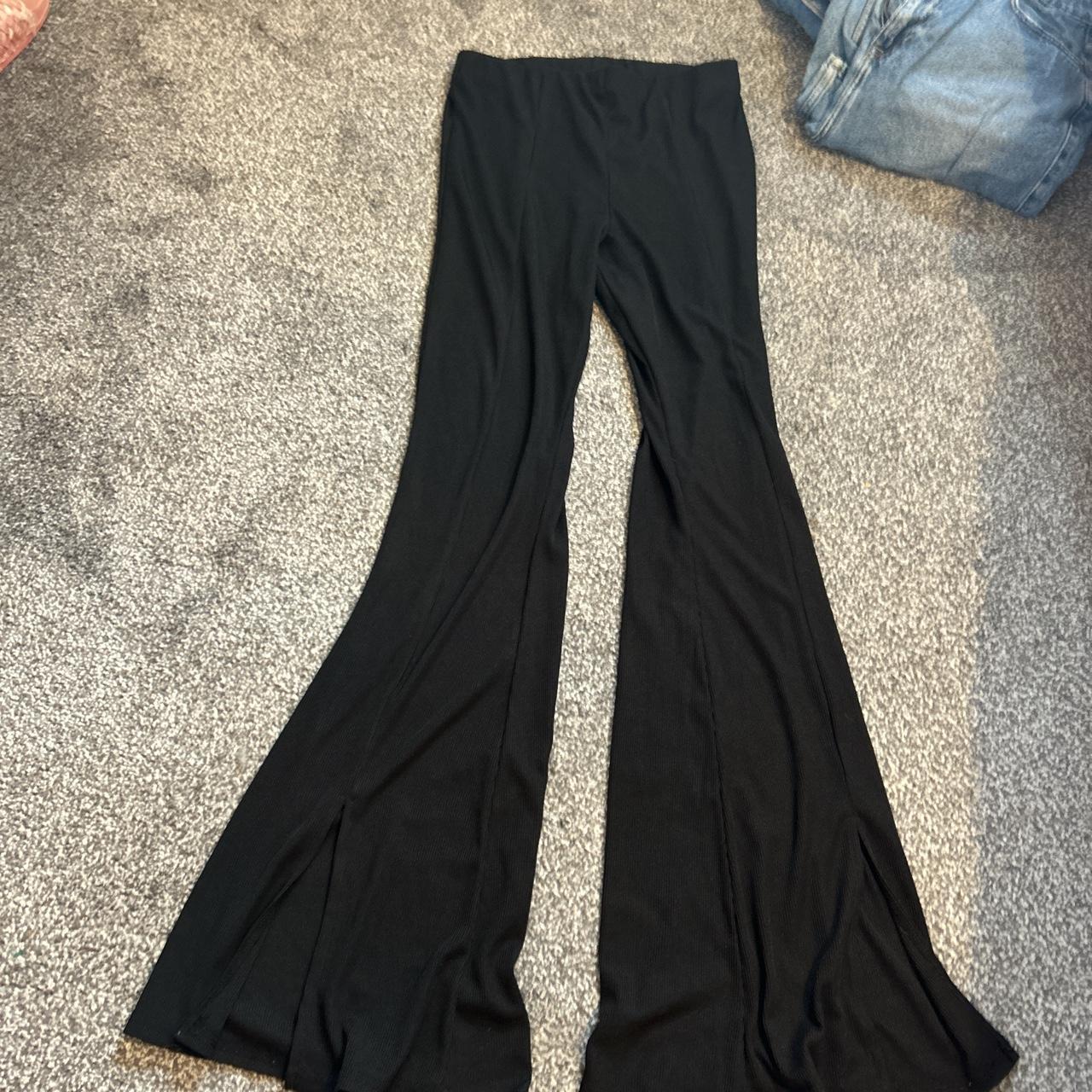 Black ribbed flares with cutout New look Size... - Depop