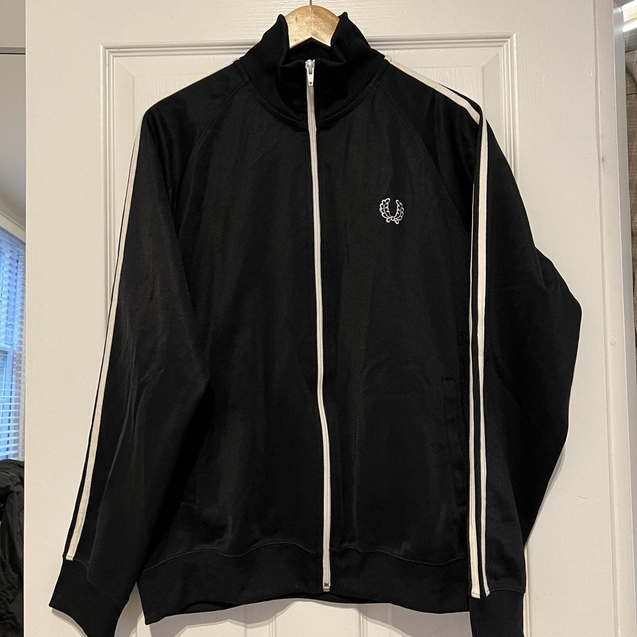 Fred Perry black zip up jacket with white stripes... - Depop