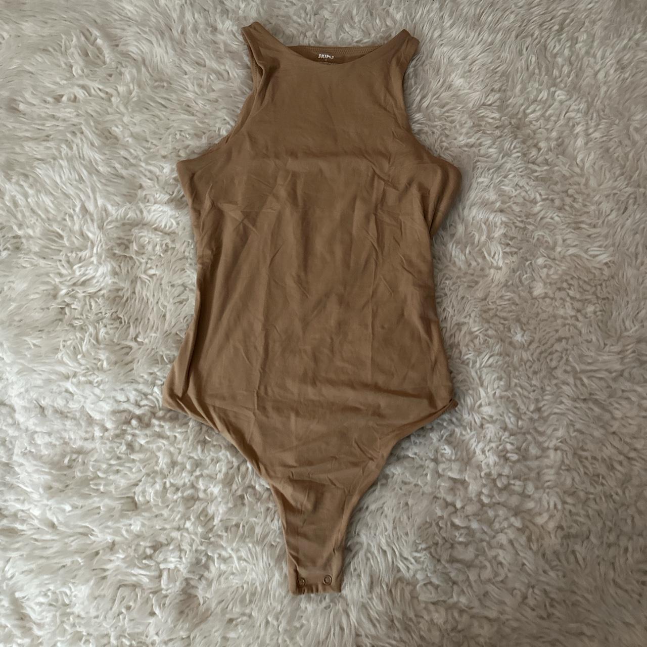 Skims brand new without tags ran bodysuit 🤎 Size xs... - Depop
