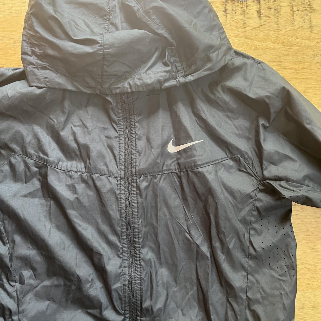 Black lightweight Nike spray jacket / rain jacket.... - Depop
