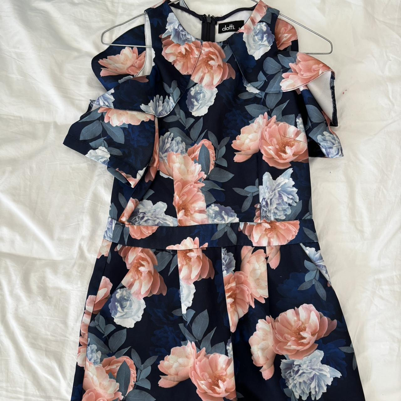 floral romper from dotti - Depop