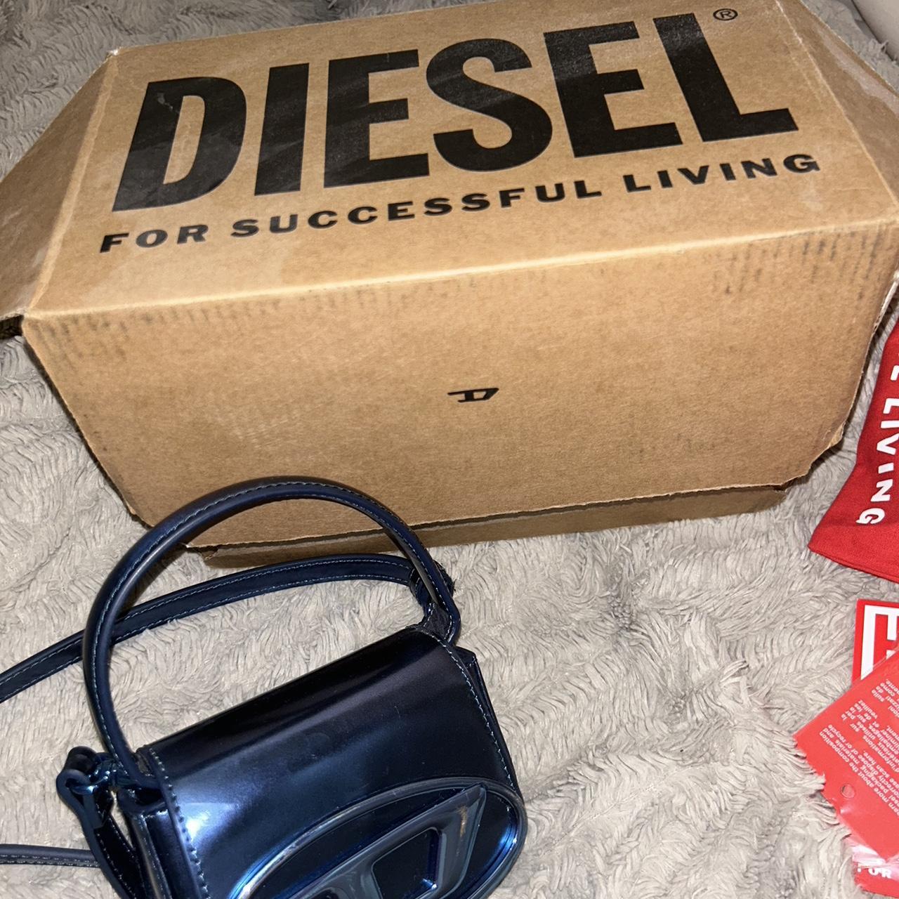 Selling my diesel bag. Mini 1DR xs blue Bought from... - Depop