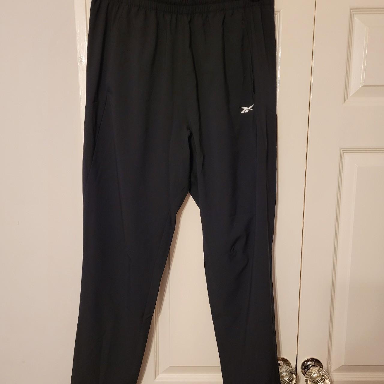 Reebok woven track bottom pants, zip leg bottoms,... - Depop