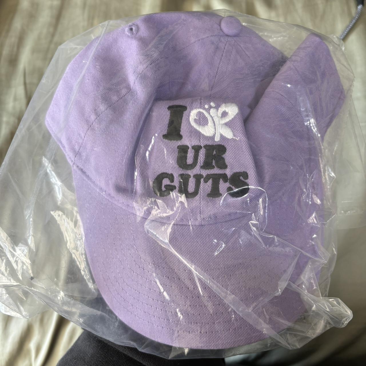 olivia rodrigo guts hat in plastic packaging still... - Depop