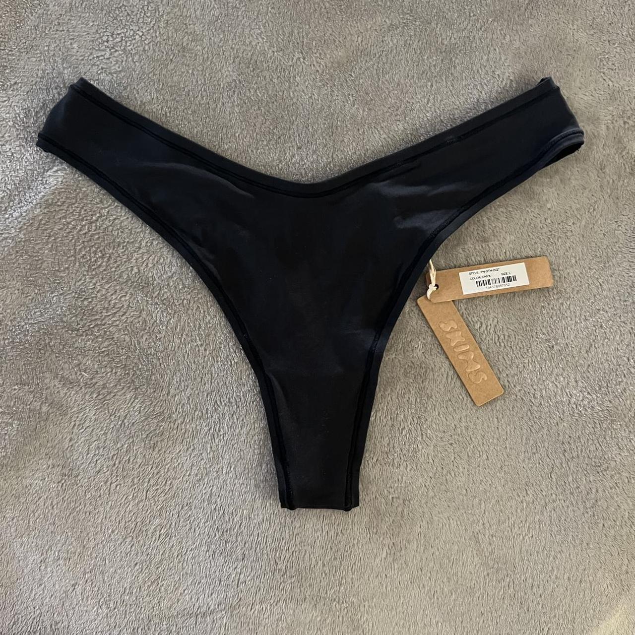 Skims Fits Everybody Dipped Front Thong | Onyx | L |... - Depop