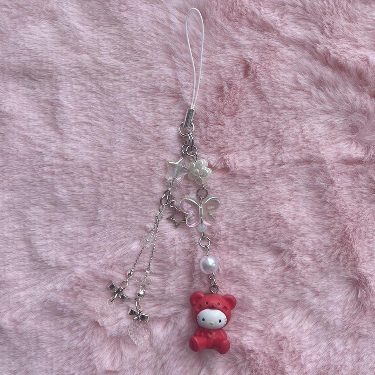 red teddy hello kitty phone strap, perfect for your... - Depop