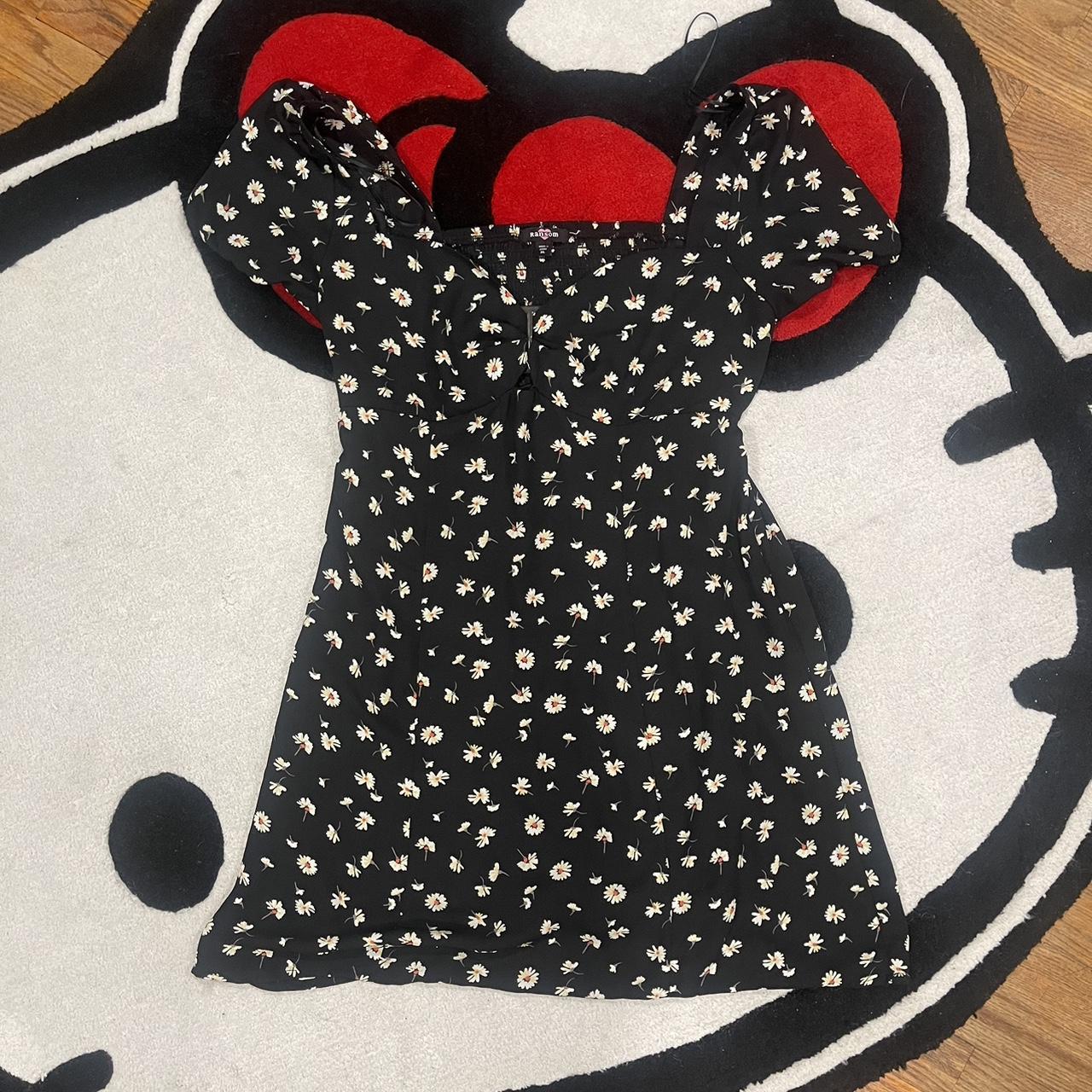 Ransom black +floral dress has a buckle by the chest... - Depop