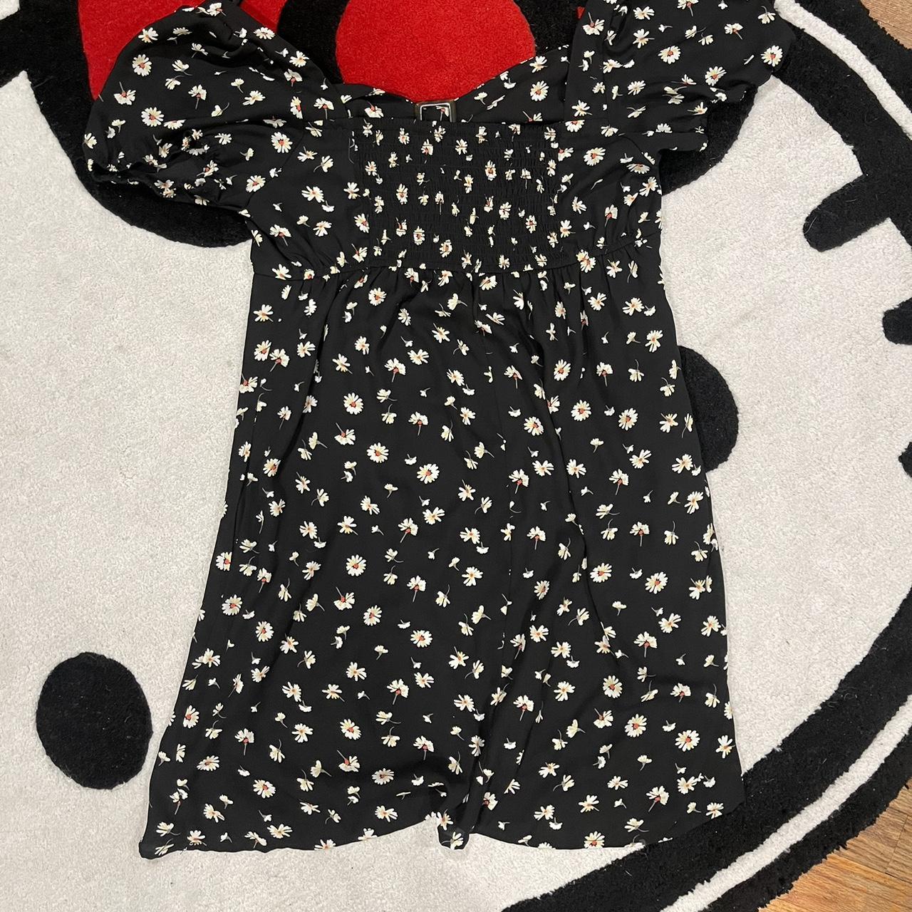 Ransom black +floral dress has a buckle by the chest... - Depop