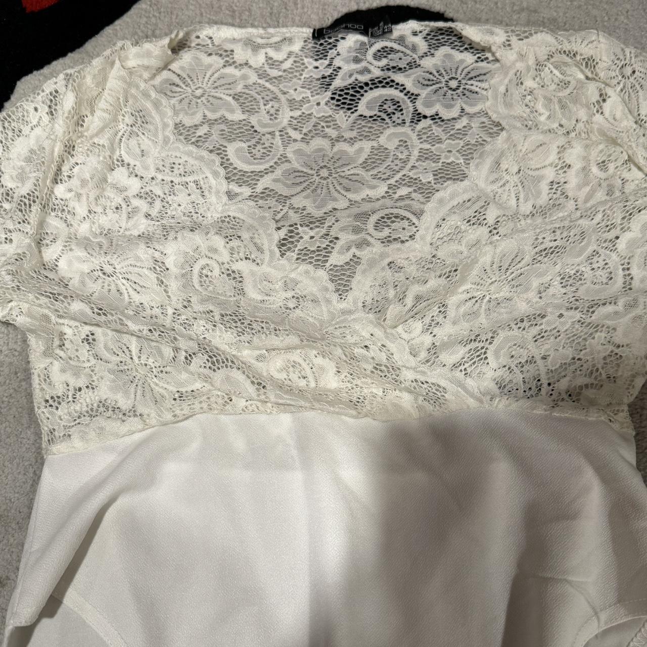 Boohoo white lace bodysuit. In good used condition... - Depop