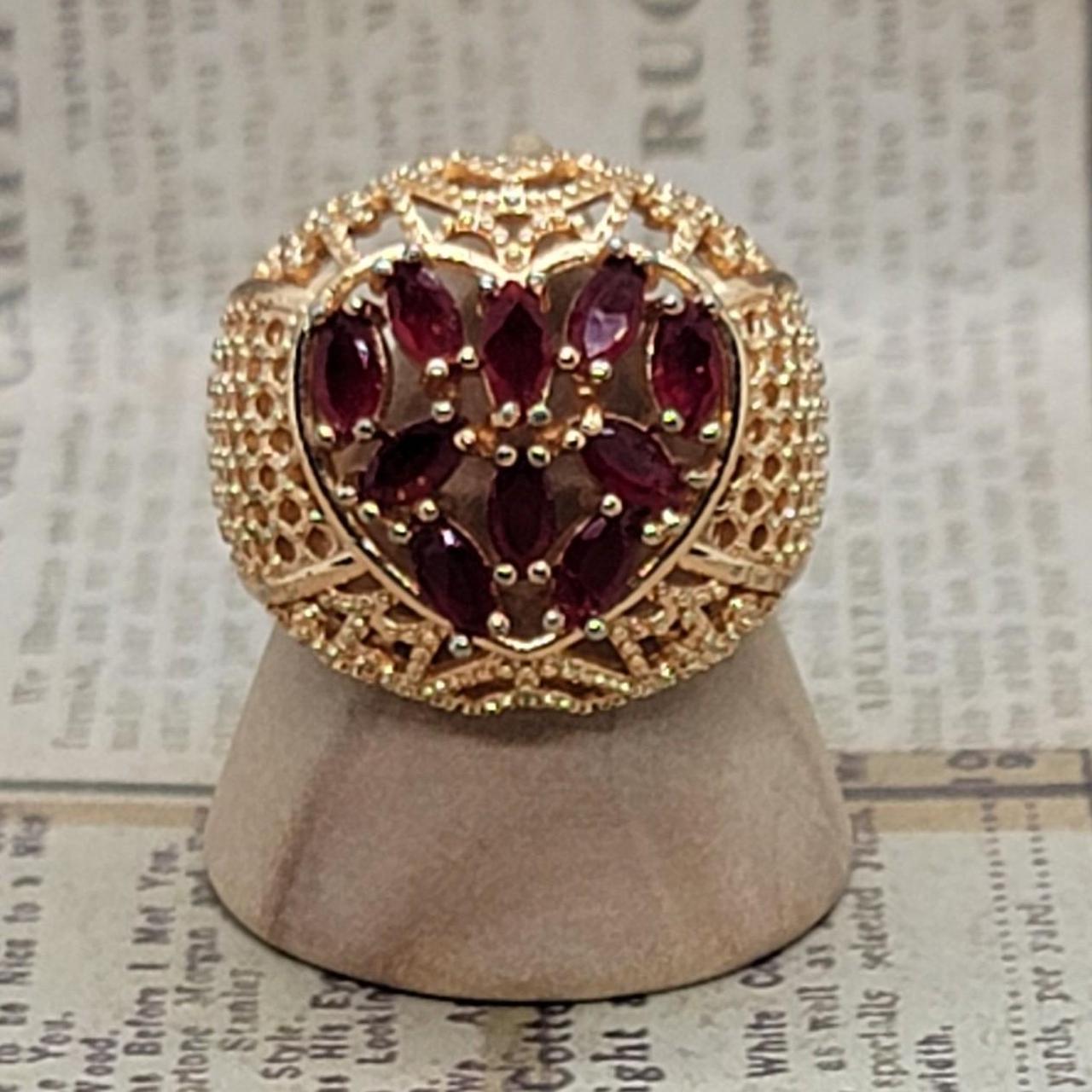 Chunky gold heart ring with red crystals good... - Depop