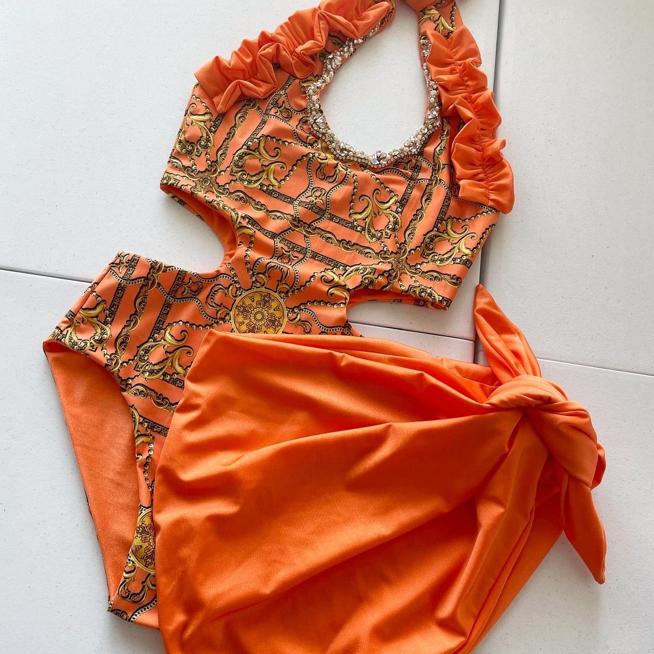 The Ella cut out costume with frills and gold... - Depop