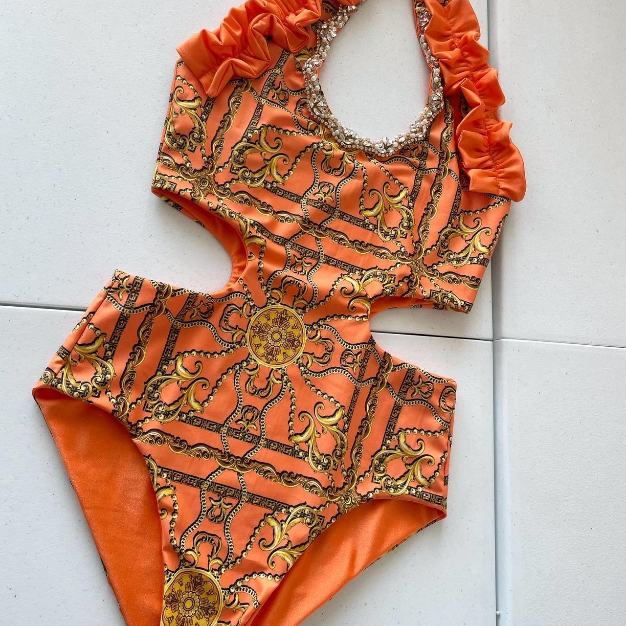 The Ella cut out costume with frills and gold... - Depop