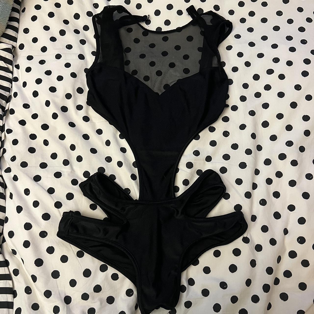 Iheartraves bodysuit. An OG. Worn only twice, but... - Depop