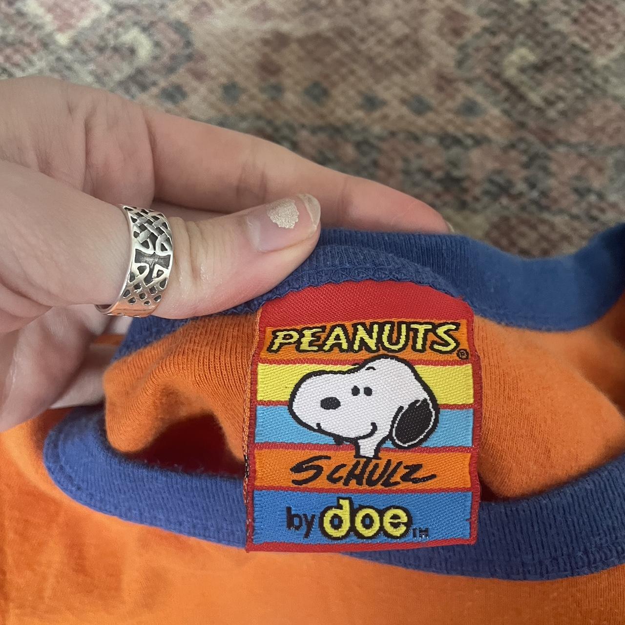 peanuts snoopy top minor wear on the graphic nothing... | Depop