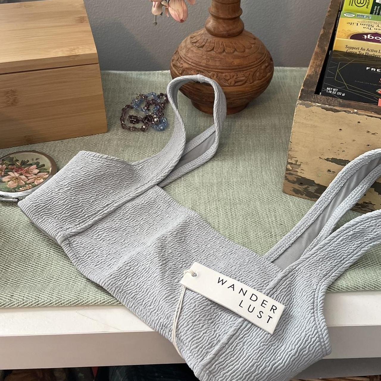 Light blue wanderlust bikini swim top. Brand new... - Depop