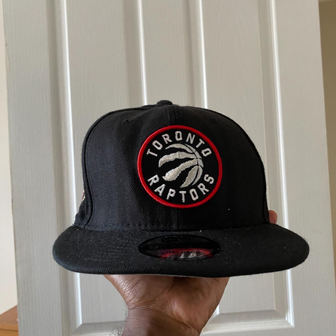 This black Toronto Raptors Hat is an official... - Depop
