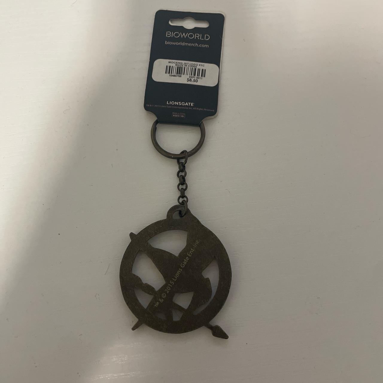 Hunger Games Mockingjay Keychain from 2015. Never... - Depop