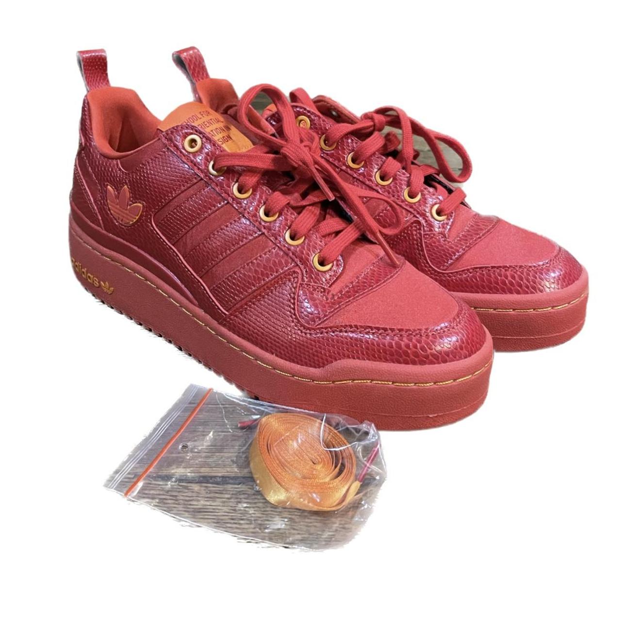 adidas red & orange “school for experiential... - Depop