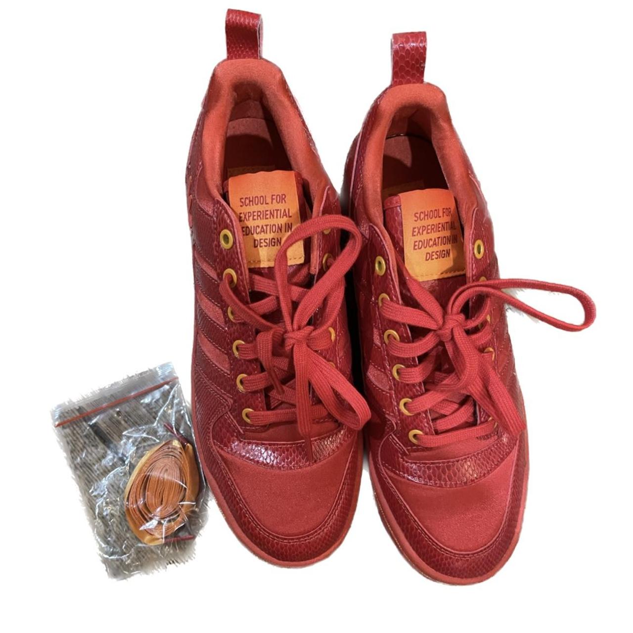 adidas red & orange “school for experiential... - Depop