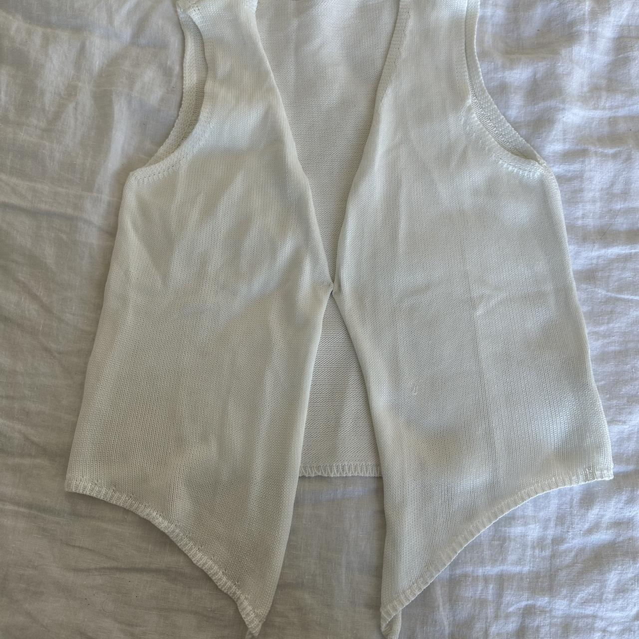 White knit vest with two snap closures, never been... - Depop