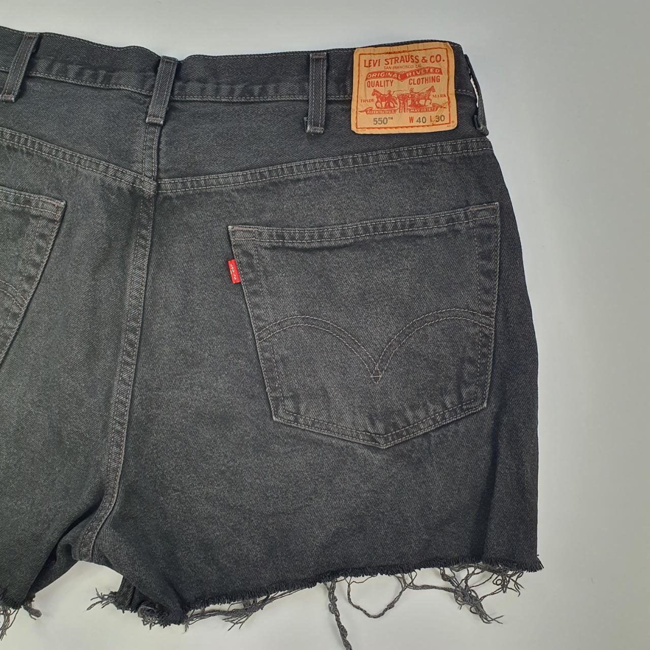 Vintage LEVI'S 550 Black Denim Cut-Off Shorts Waist... - Depop