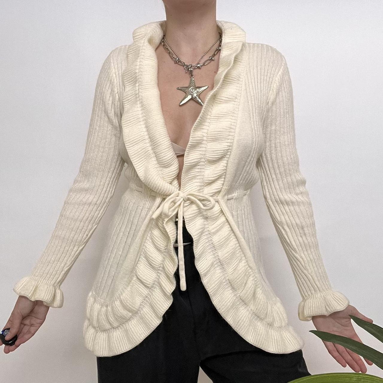 Cream knit cardigan sweater with ruffles and tie... - Depop