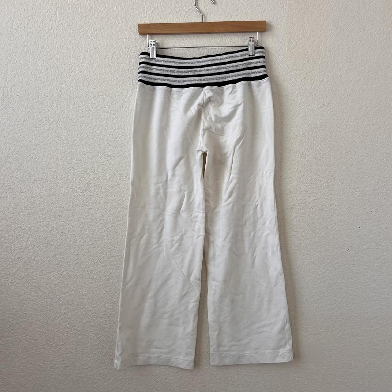 White and black striped Bebe sweatpants #y2kfashion... - Depop