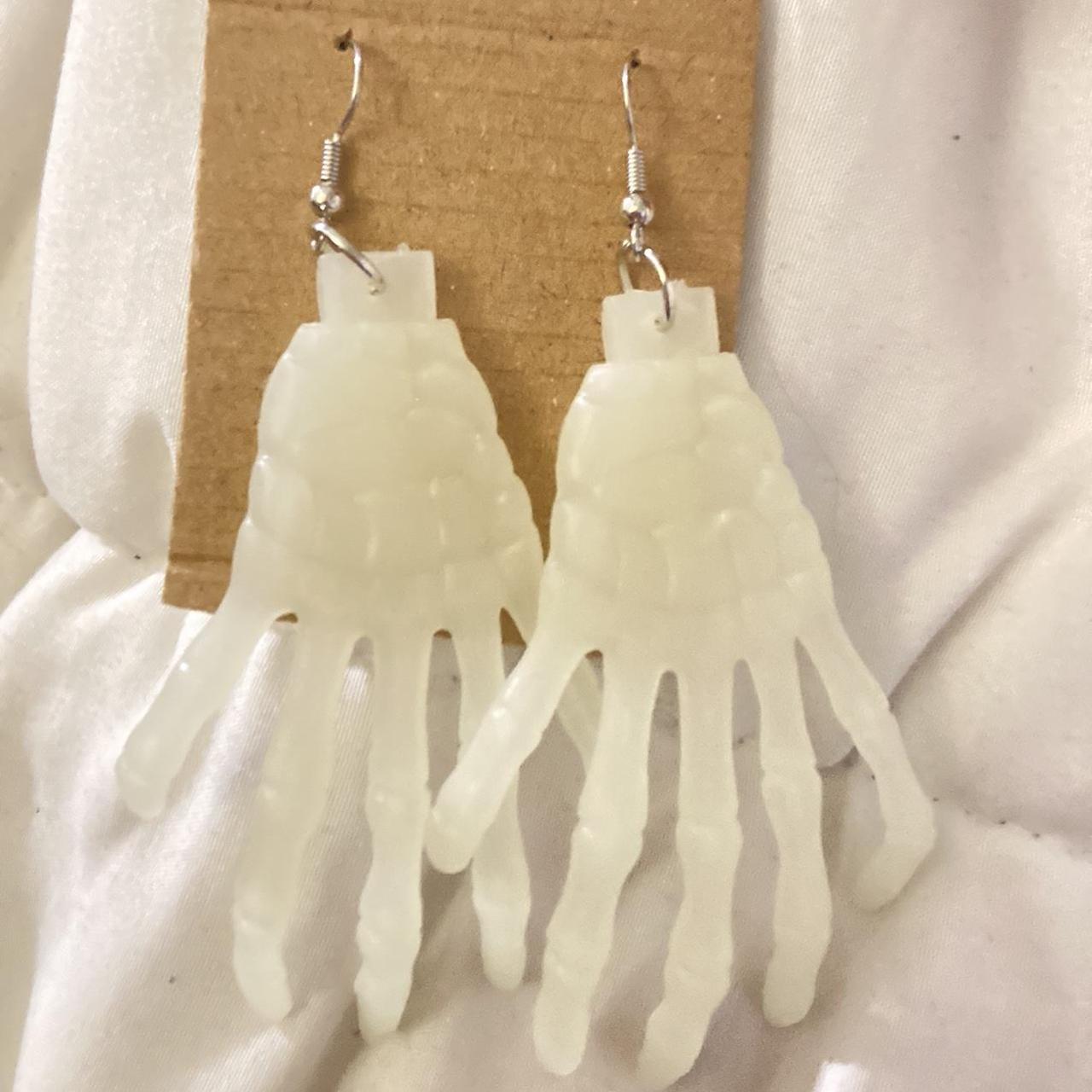 skeleton hand earrings (they glow in the dark too... - Depop