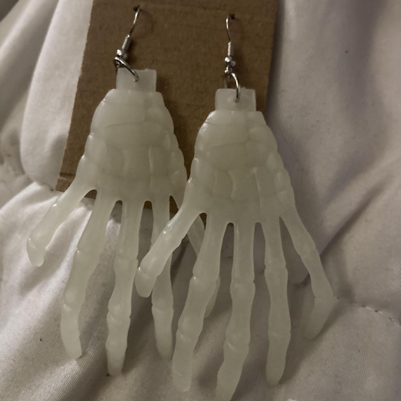 skeleton hand earrings (they glow in the dark too... - Depop