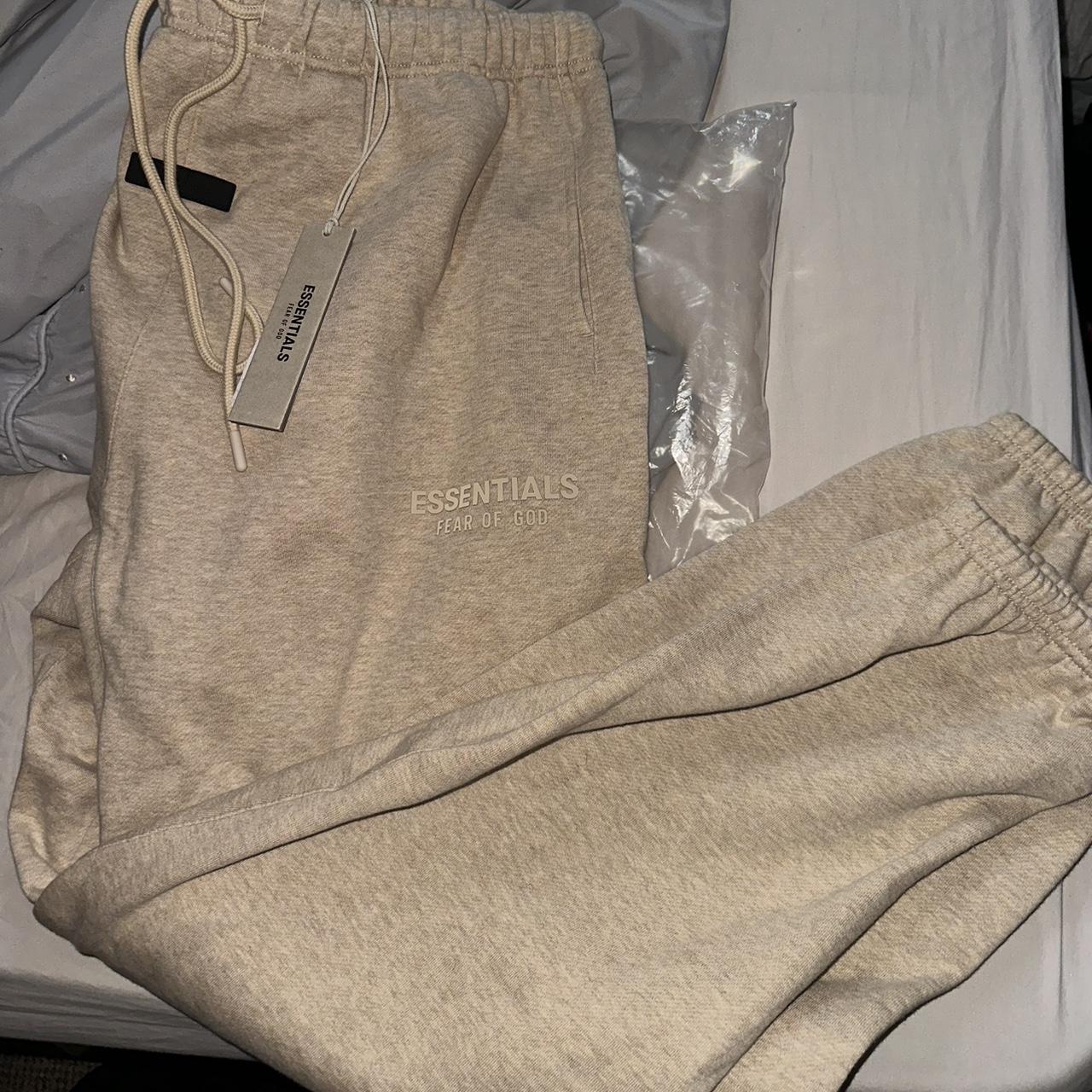 Gold heather essentials tracksuit bottoms L - Depop
