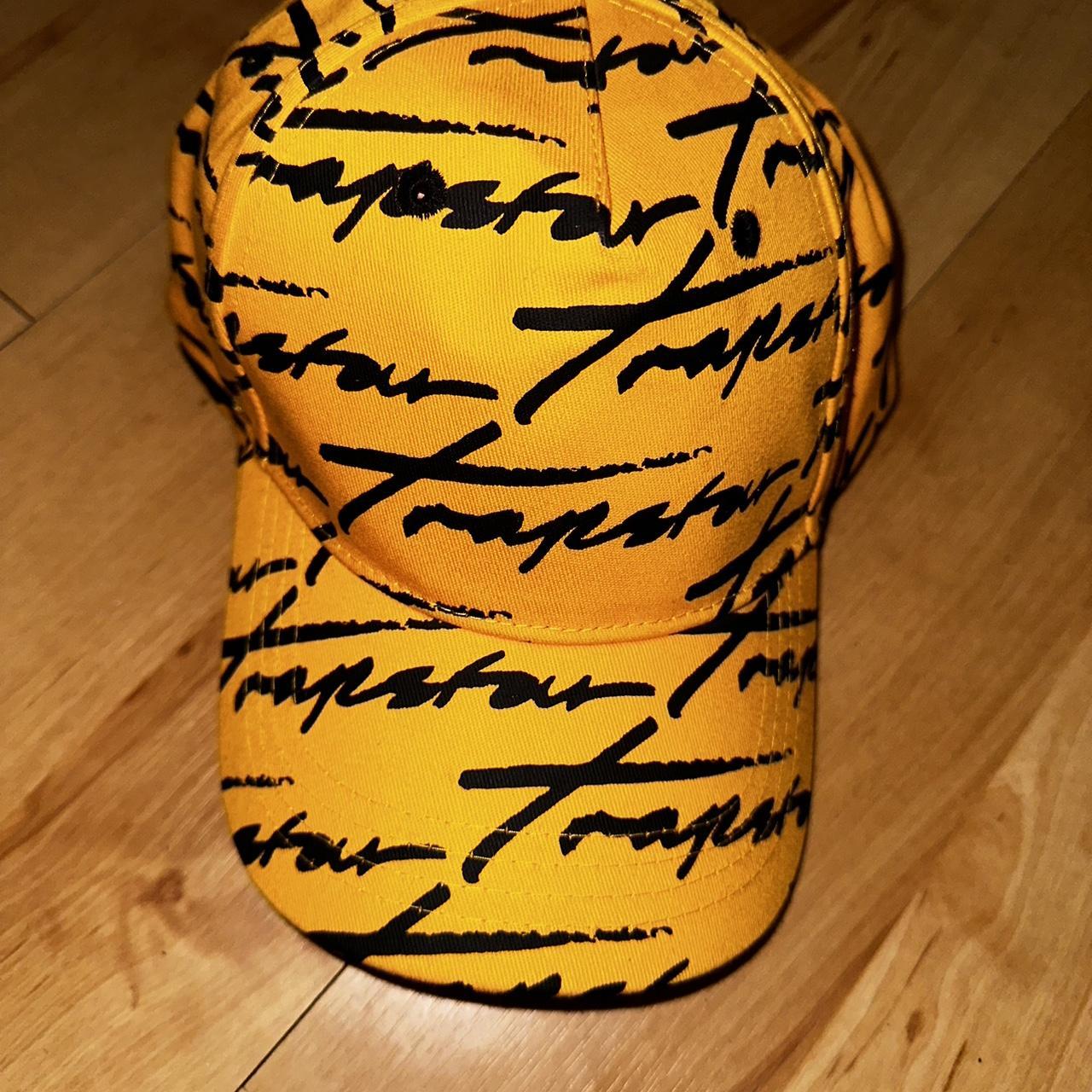 Yellow and black Trapstar baseball cap - Depop