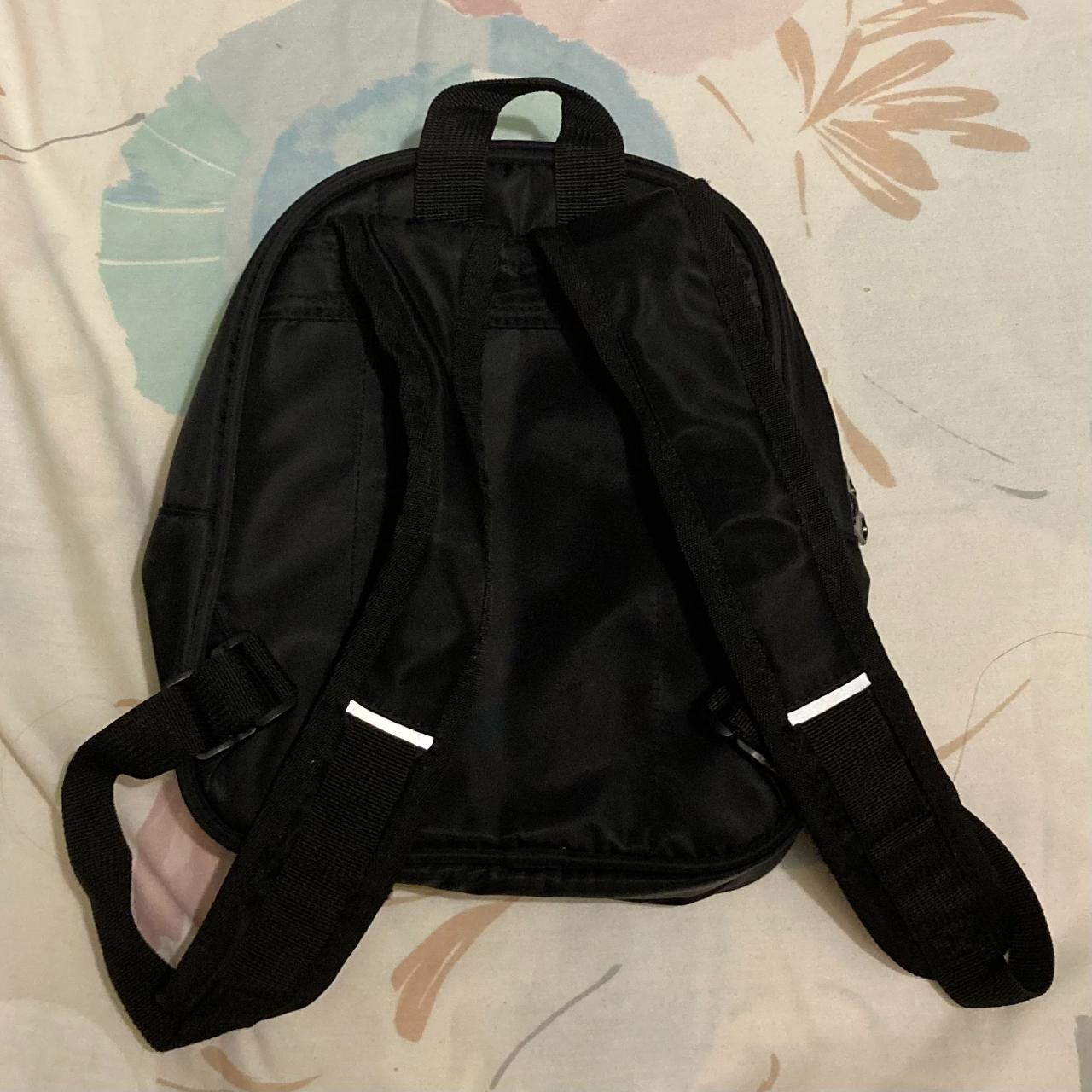 mini black backpack, with a cool cloud print lining!... - Depop