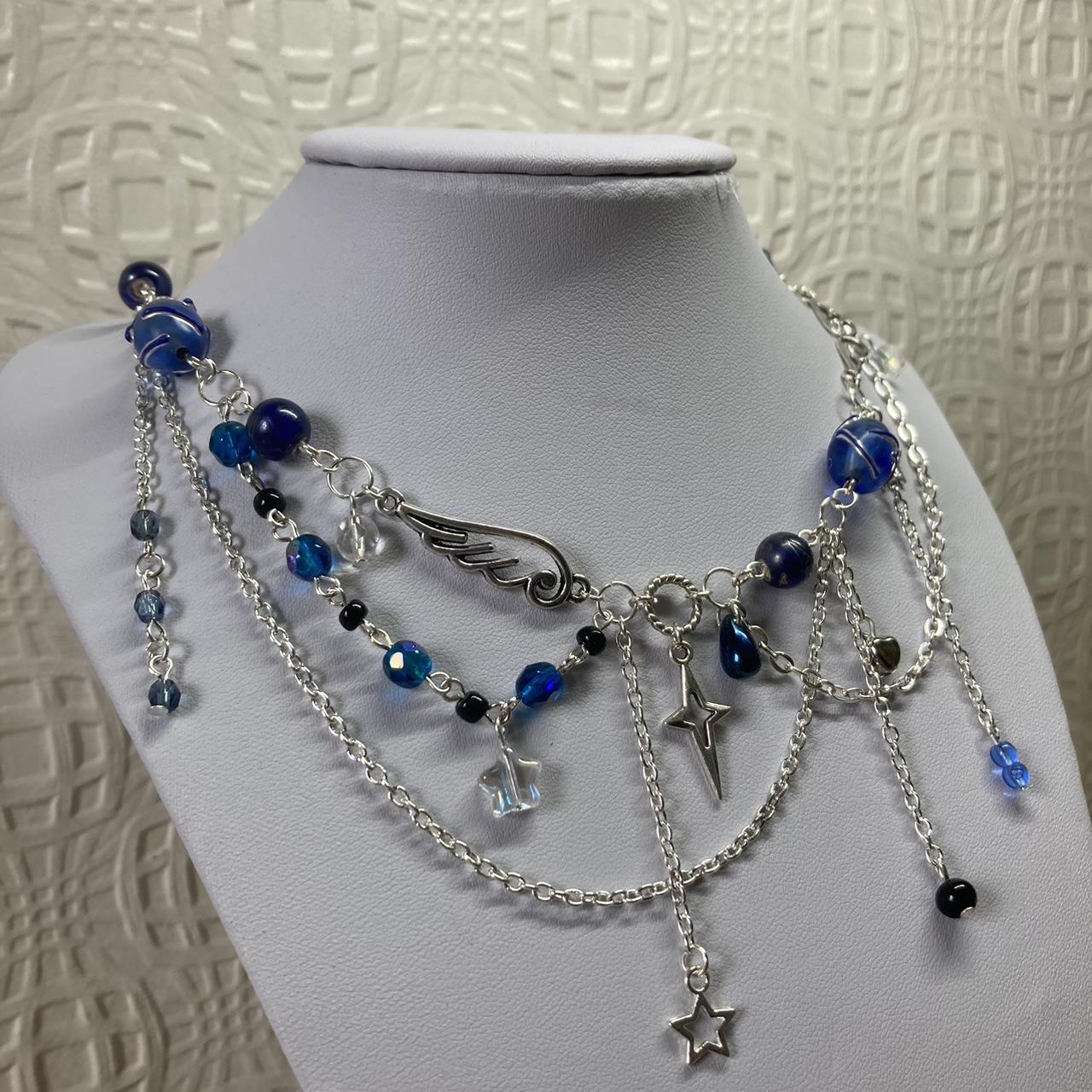 handmade silver and blue clutter necklace with star... - Depop
