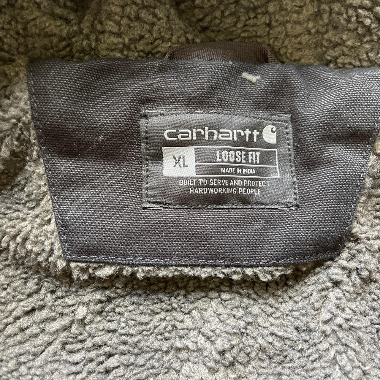 Black hooded Carhartt active jacket with soft, grey... - Depop