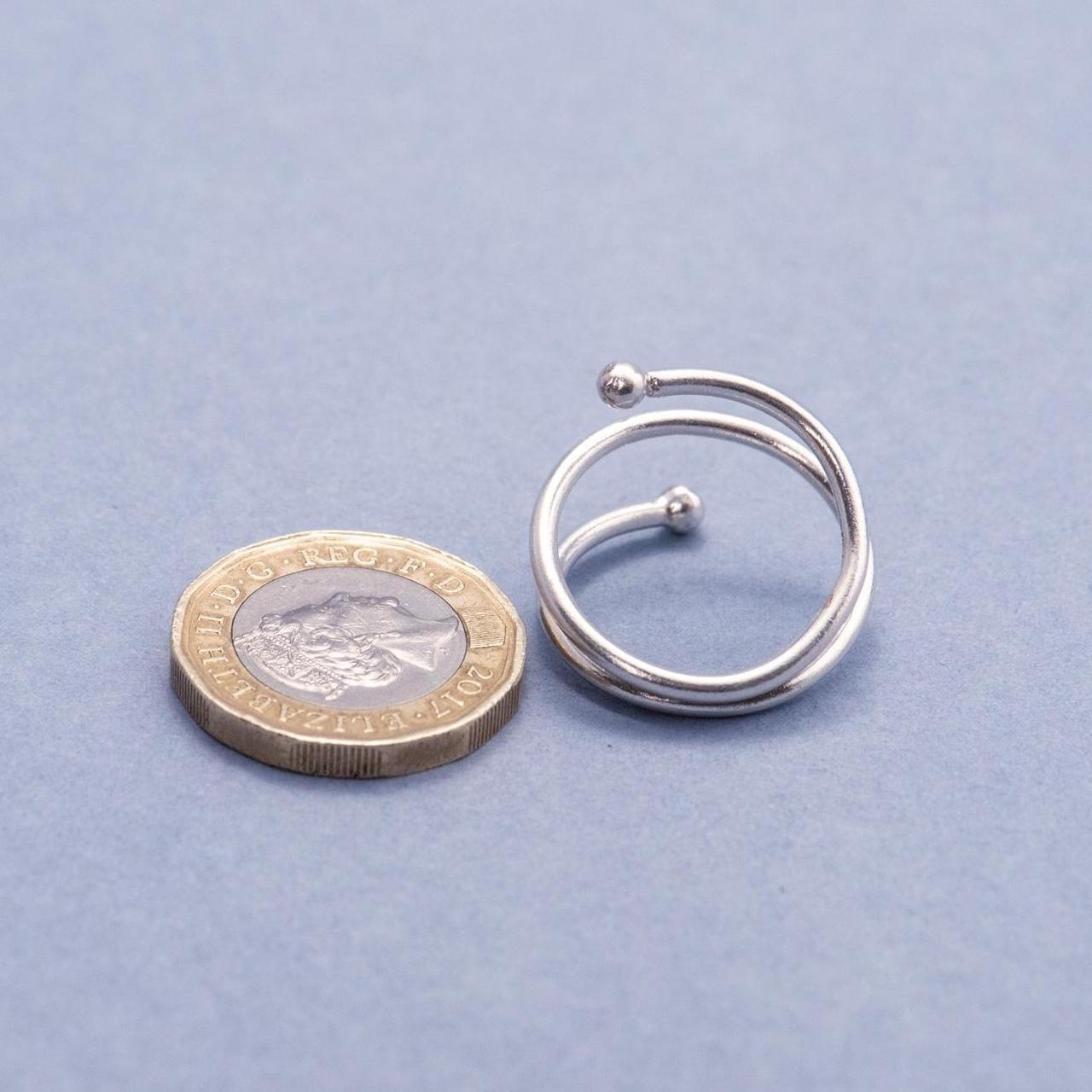 Solid sterling silver corkscrew design ring... - Depop